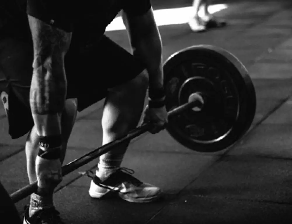 Muscle-Building Inspiration: 50 Weight Lifting Quotes - Elite Feet
